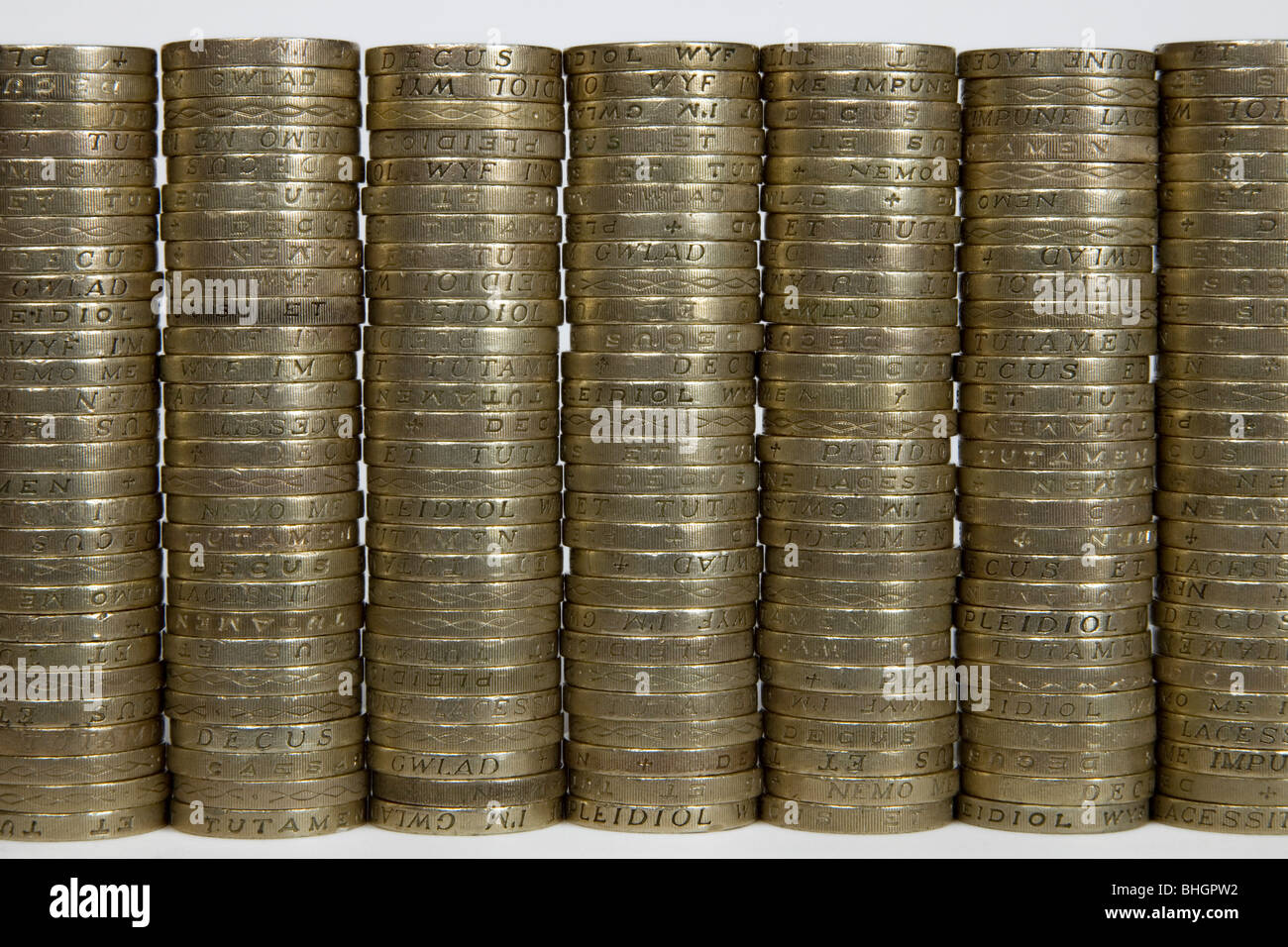 seven stacks of UK one pound coins - this is a photo using old £1 coins ...
