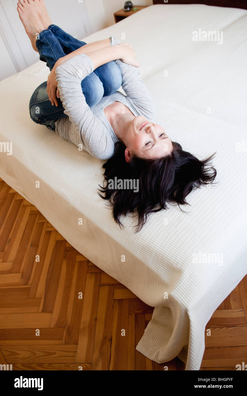 Fetal position lying hi-res stock photography and images - Alamy