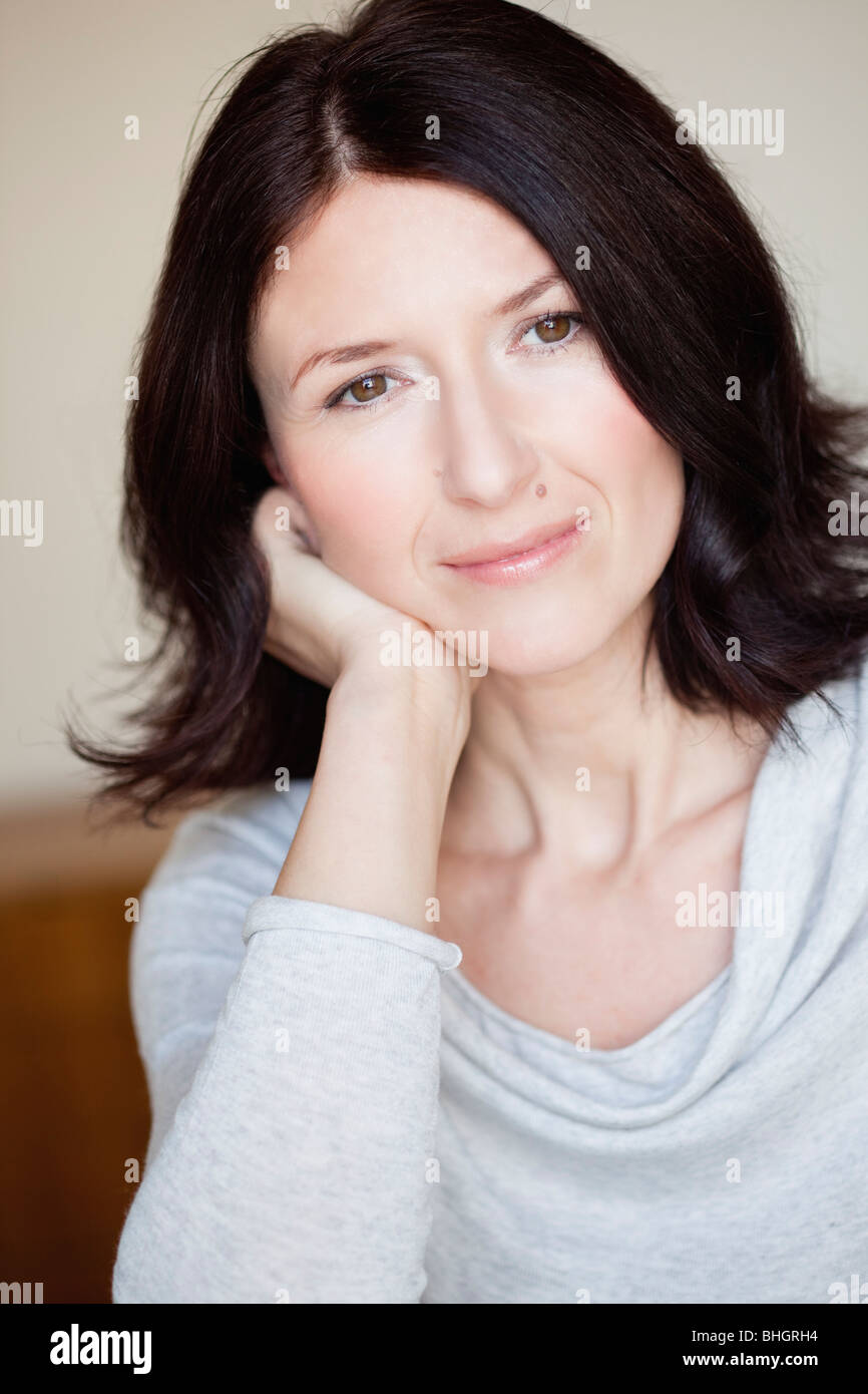 Resting head in hand hi-res stock photography and images - Alamy