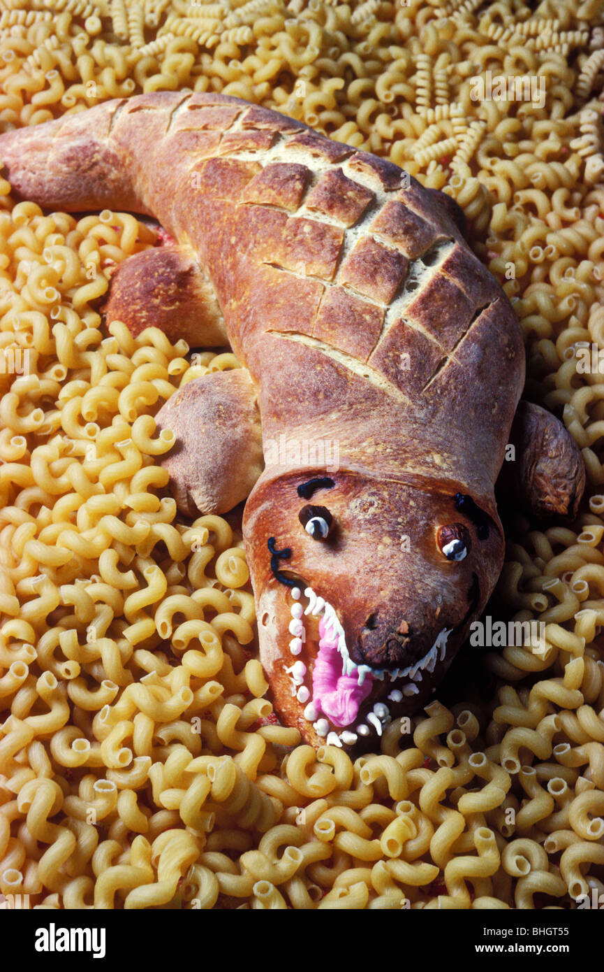 Alligator made of sour dough bread on pasta Stock Photo - Alamy