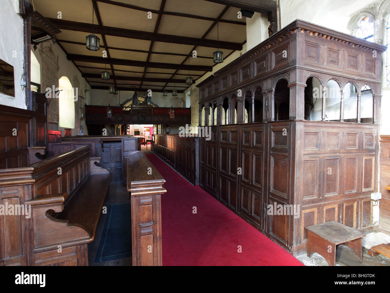 Paneling of the boxed pew and choir stall reflect a quiet and relaxing ...