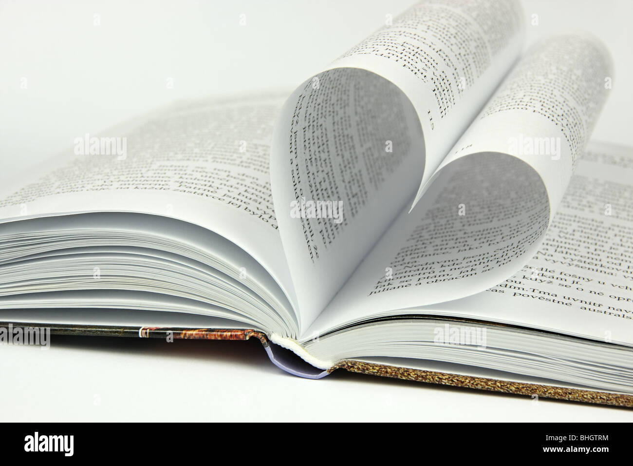 Open book and shape of the heart Stock Photo - Alamy