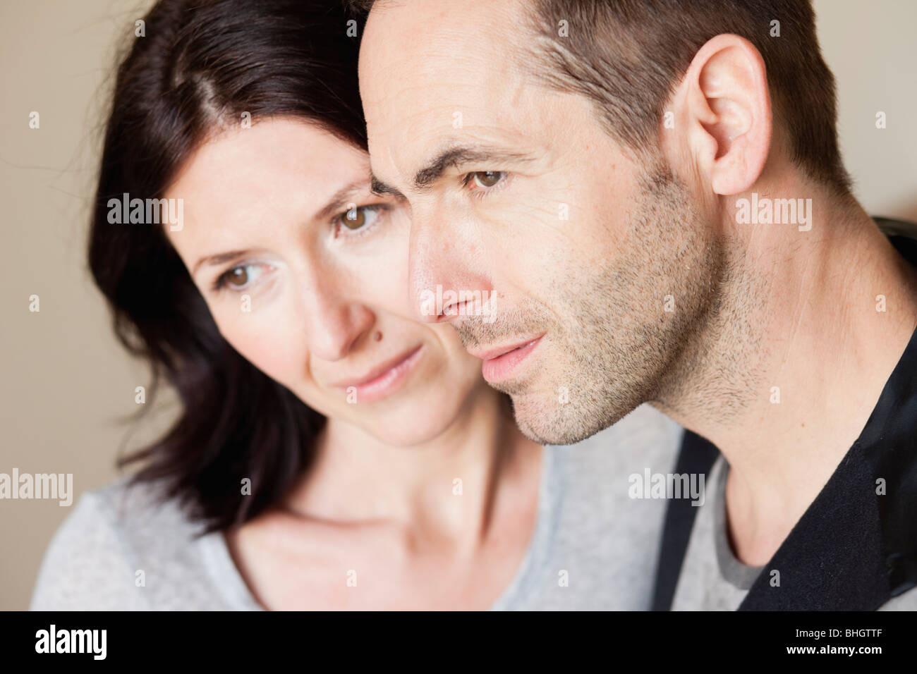 couple thinking cheek to cheek Stock Photo - Alamy