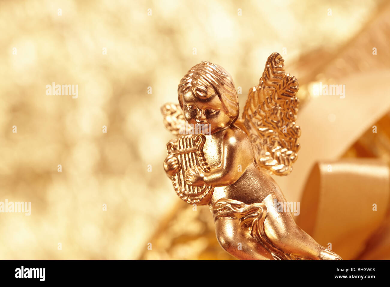 Angel And Present High Resolution Stock Photography and Images - Alamy