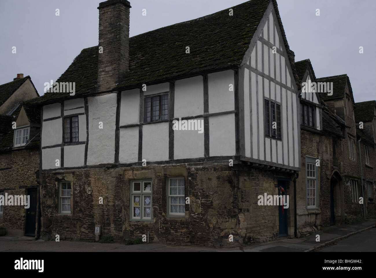 Half-timbered, tudor stone buildings in Lacock Village Wiltshire, UK ...