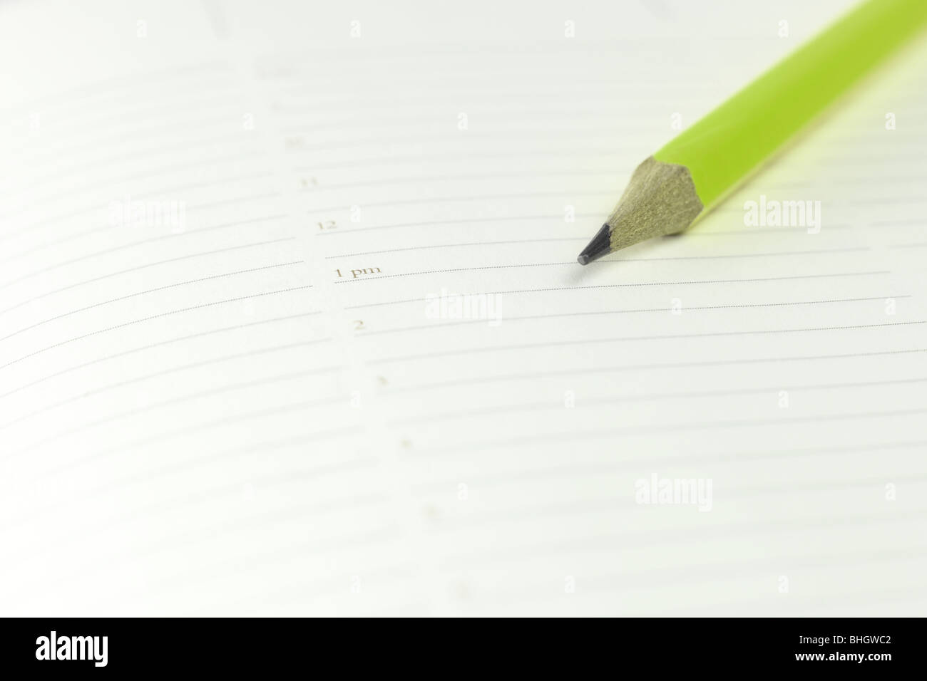 Blank diary page with green pencil Stock Photo - Alamy