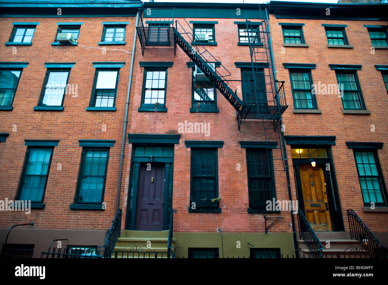 Old brick apartment buildings in a big city Stock Photo - Alamy