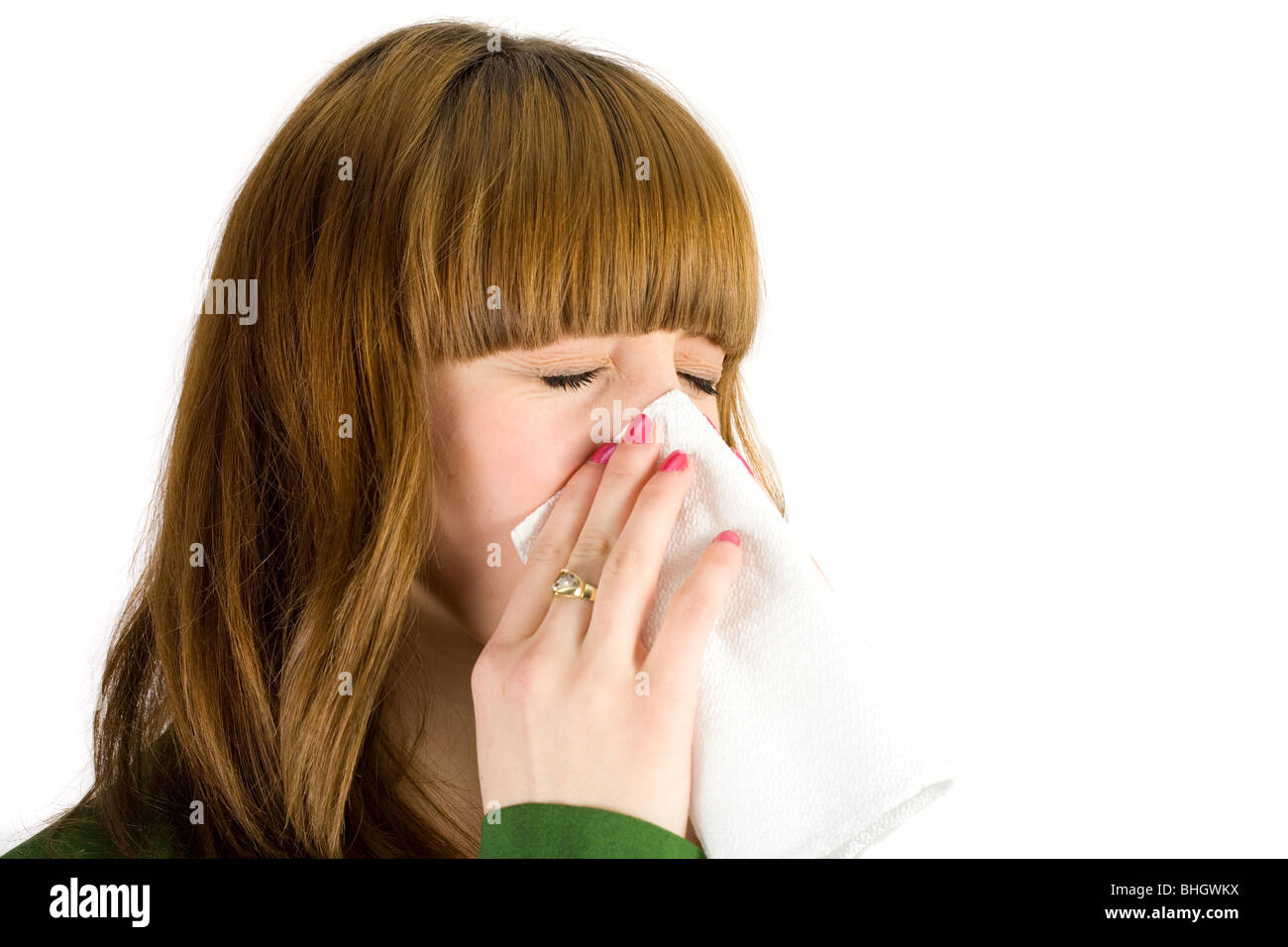 Blonde girl blowing nose, isolated on white background Stock Photo - Alamy