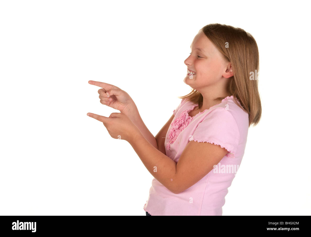 a young girl pointing isolated on white Stock Photo - Alamy