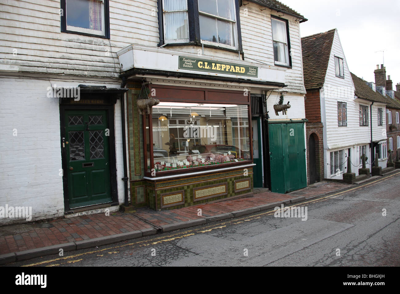 Traditional English High Street family butcher shop in an East Sussex ...