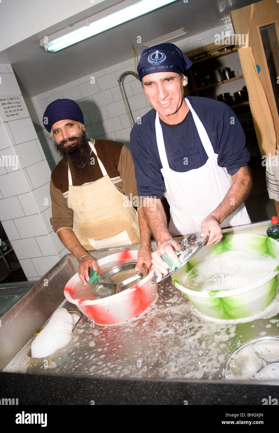 volunteer's help out with the washing inside the kitchen of the ...