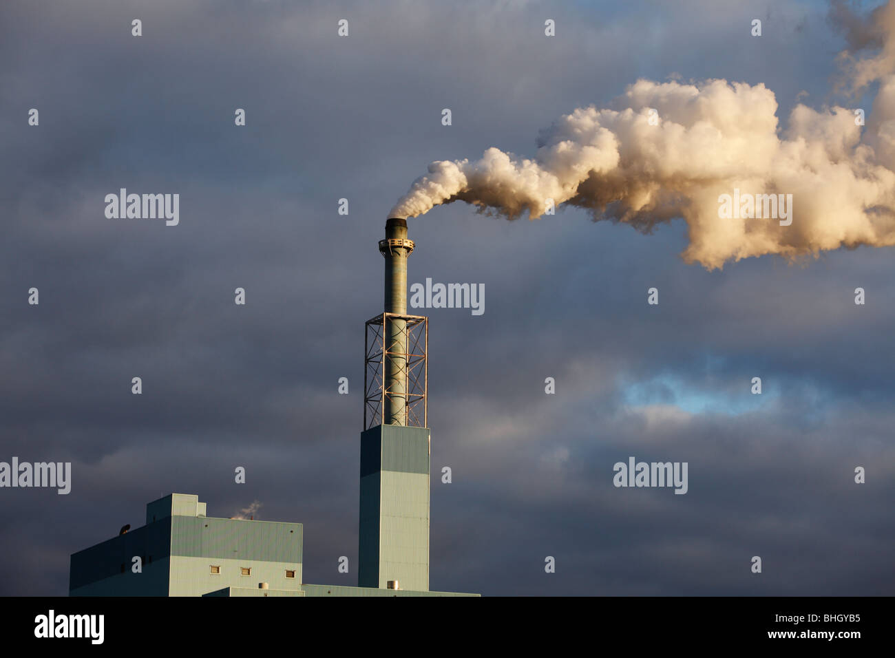 Smoke billowing from a stack at a paper mill Stock Photo - Alamy