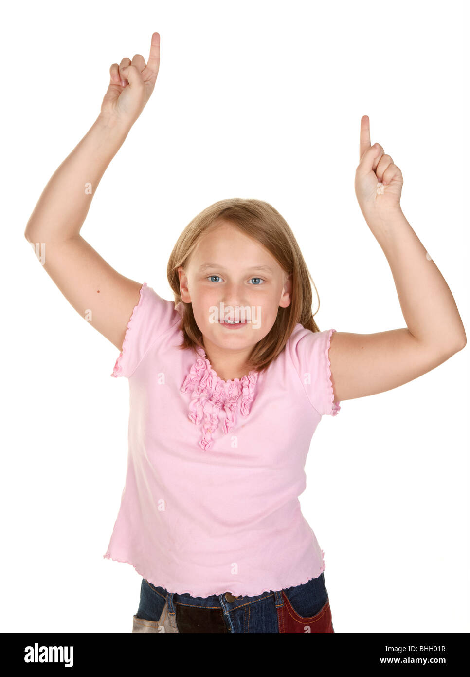 young girl doing the winners dance isolated on white Stock Photo - Alamy