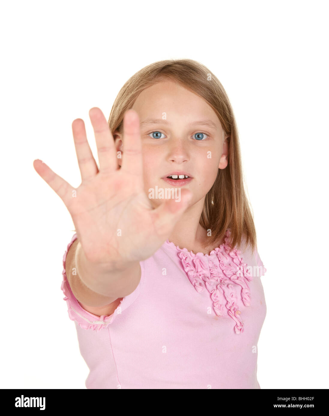 get back young girl isolated on white Stock Photo - Alamy