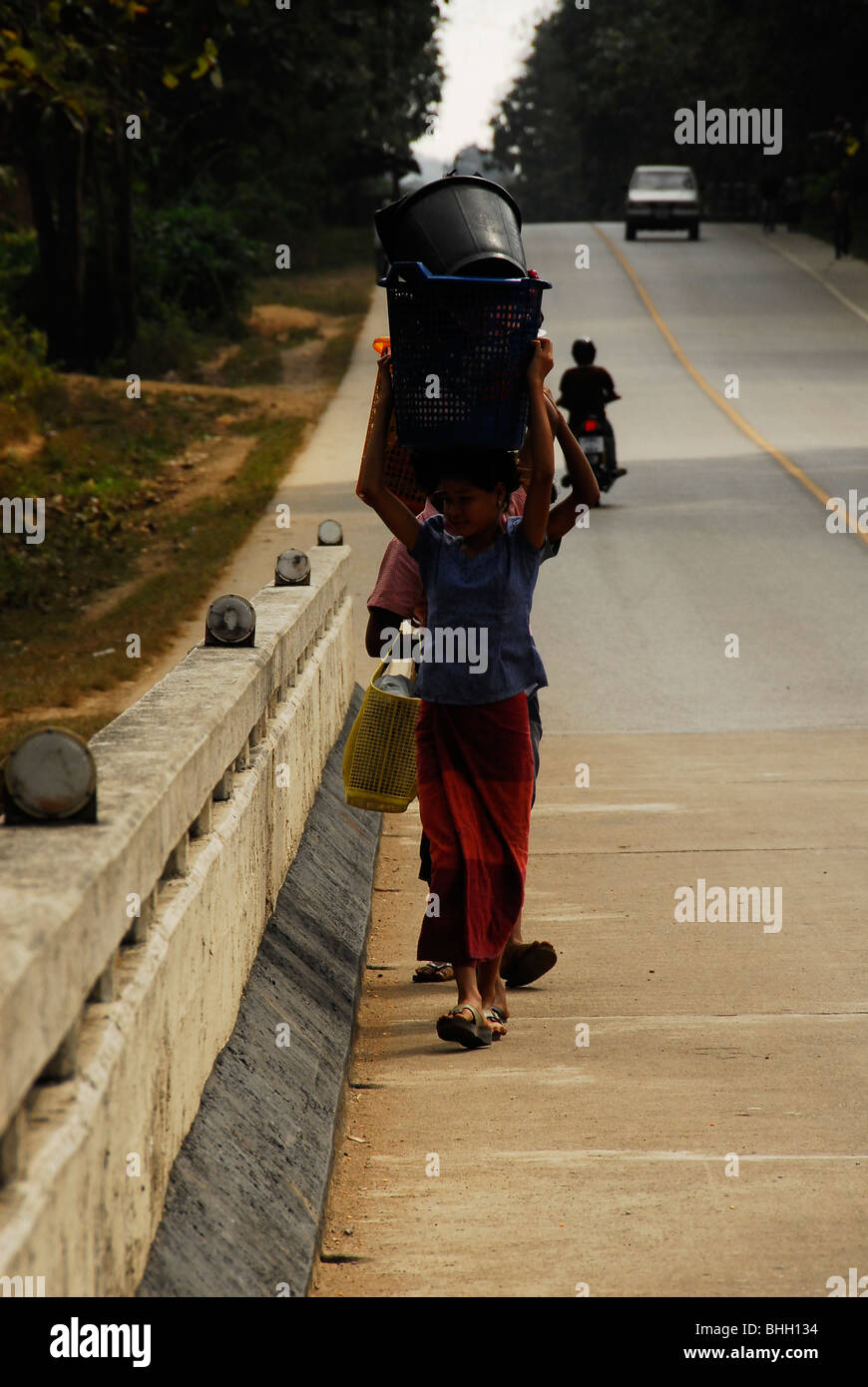 karen lady going to stream to wash clothes , mae la refugee camp , near ...