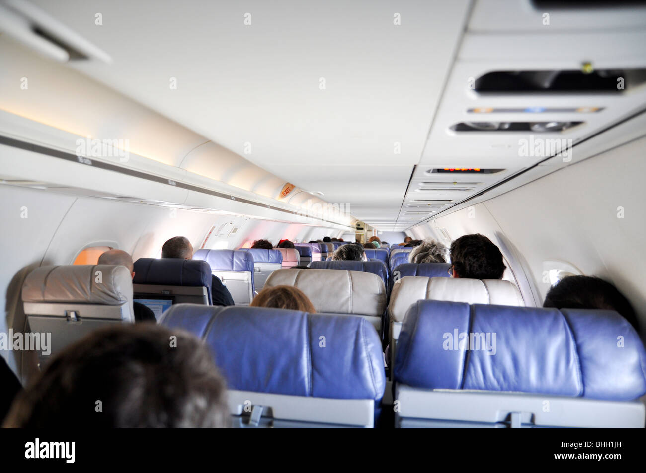 View down airplane aisle Stock Photo - Alamy