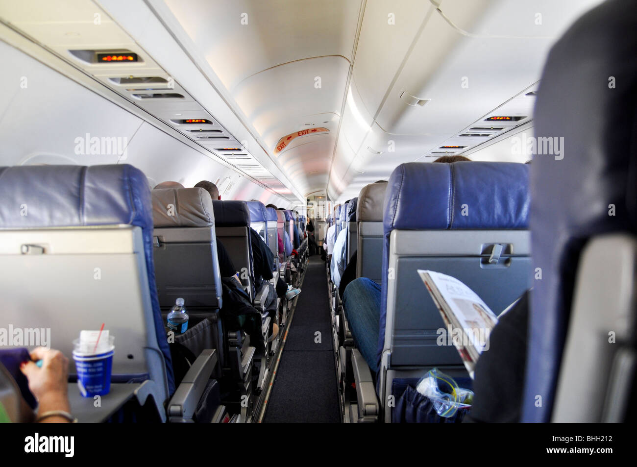 View down airplane aisle Stock Photo - Alamy