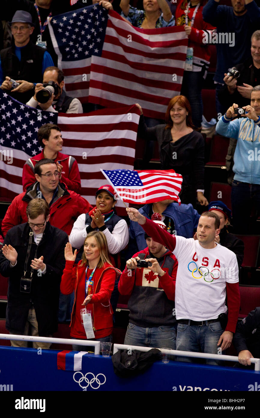USA fans cheering Apolo Anton Ohno after winning the silver medal in the 1500m Short Track Speed ...