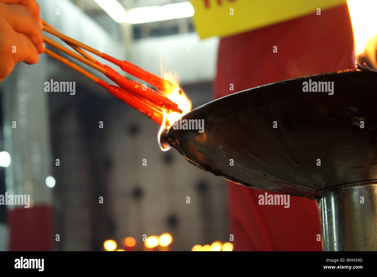 People using lamp oil , Bangkok's Chinatown, Thailand Stock Photo - Alamy