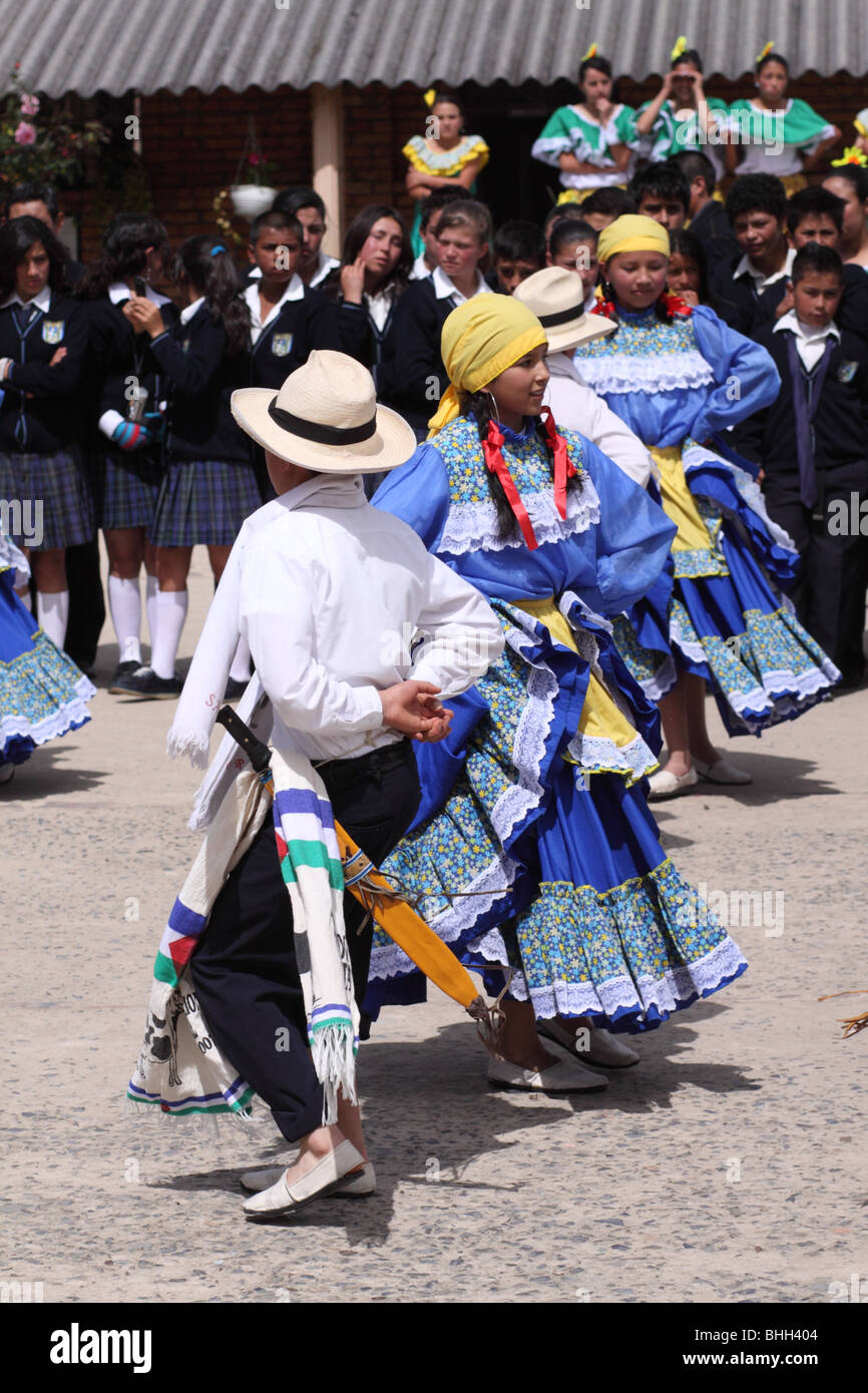 students of a rural school performing folkloric dances in the courtyard ...