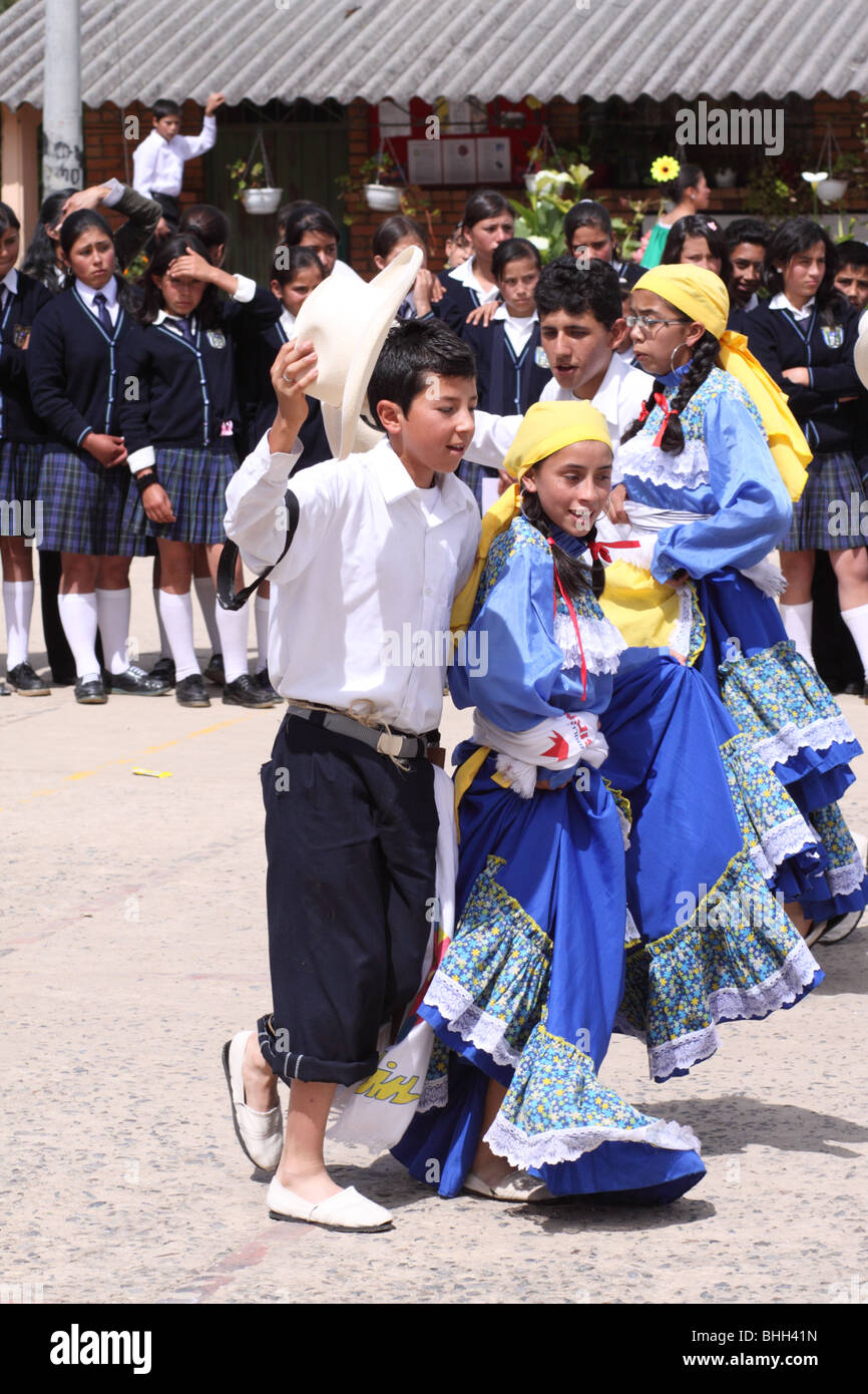 students of a rural school performing folkloric dances in the courtyard ...