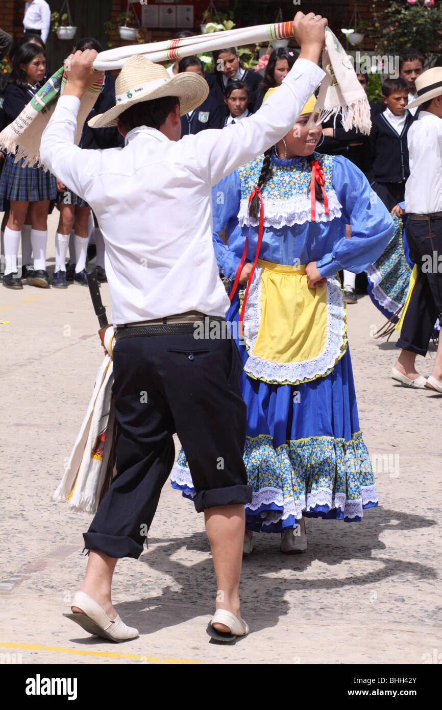students of a rural school performing folkloric dances in the courtyard ...