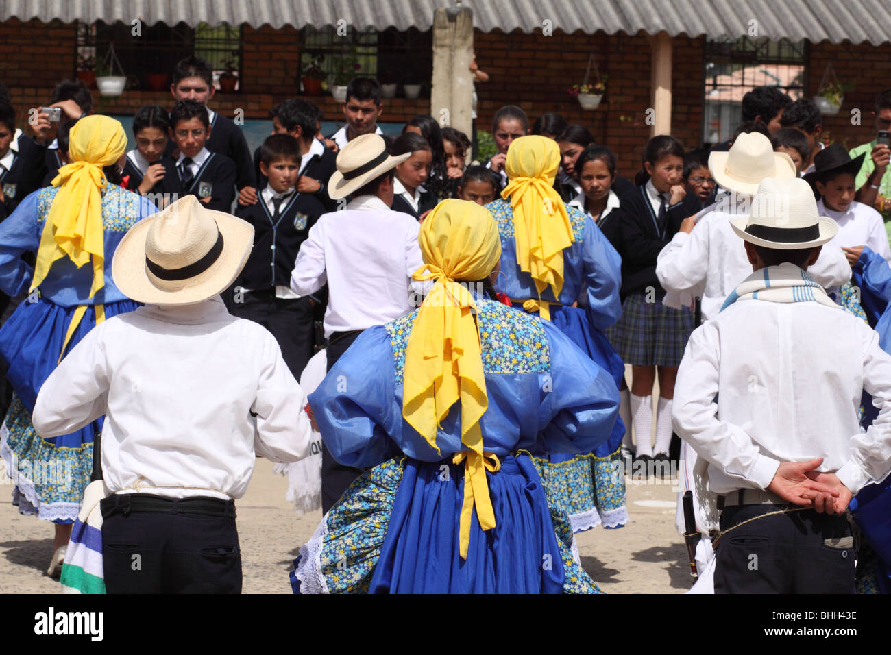 students of a rural school performing folkloric dances in the courtyard ...