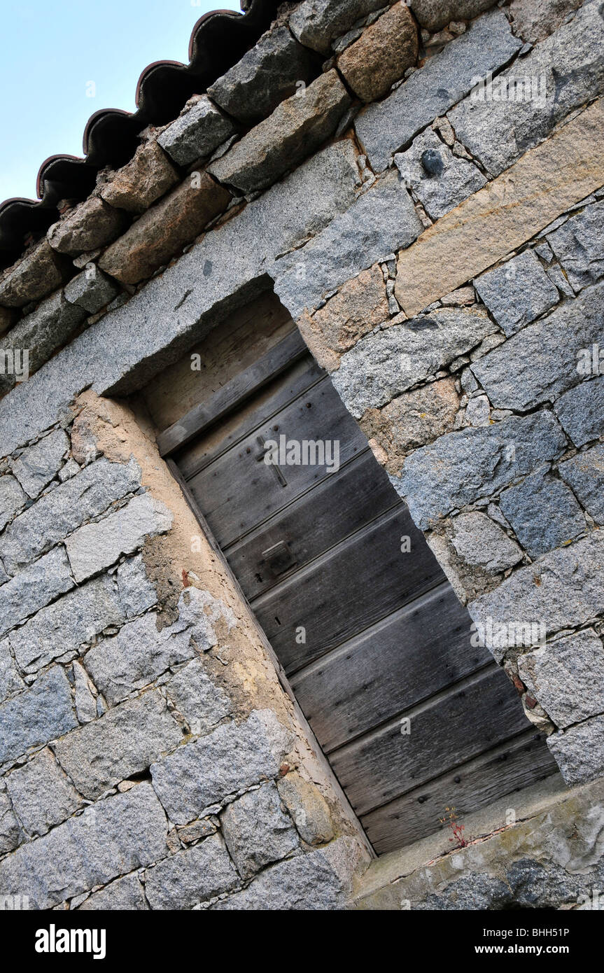 Wooden barn door with crucifix in an inland corsican village Stock ...