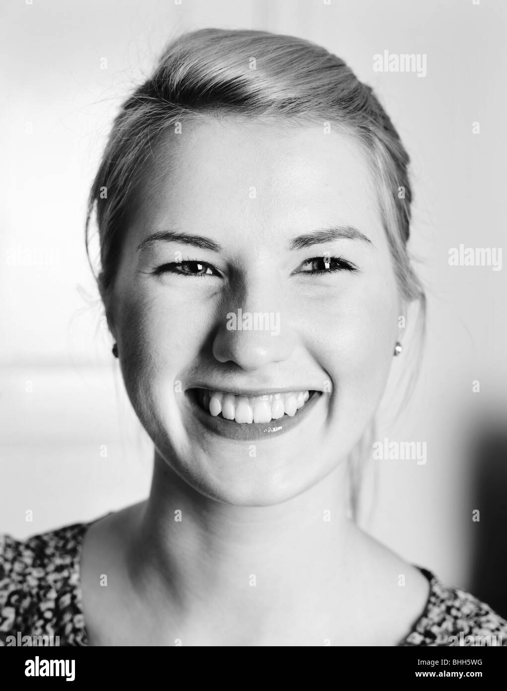 Positive young woman smiling camera Black and White Stock Photos ...