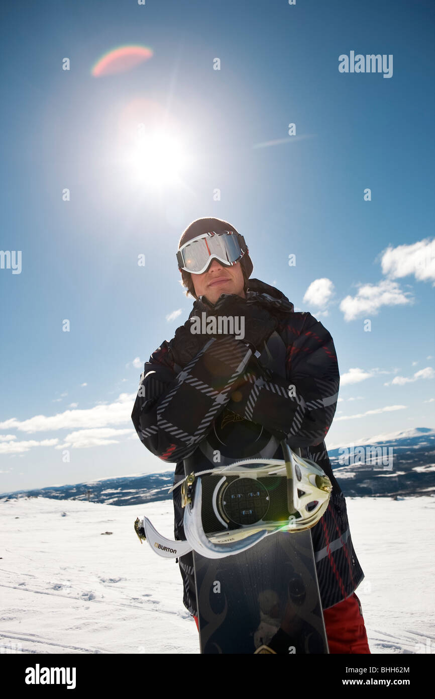 Man with a snowboard, Sweden Stock Photo - Alamy