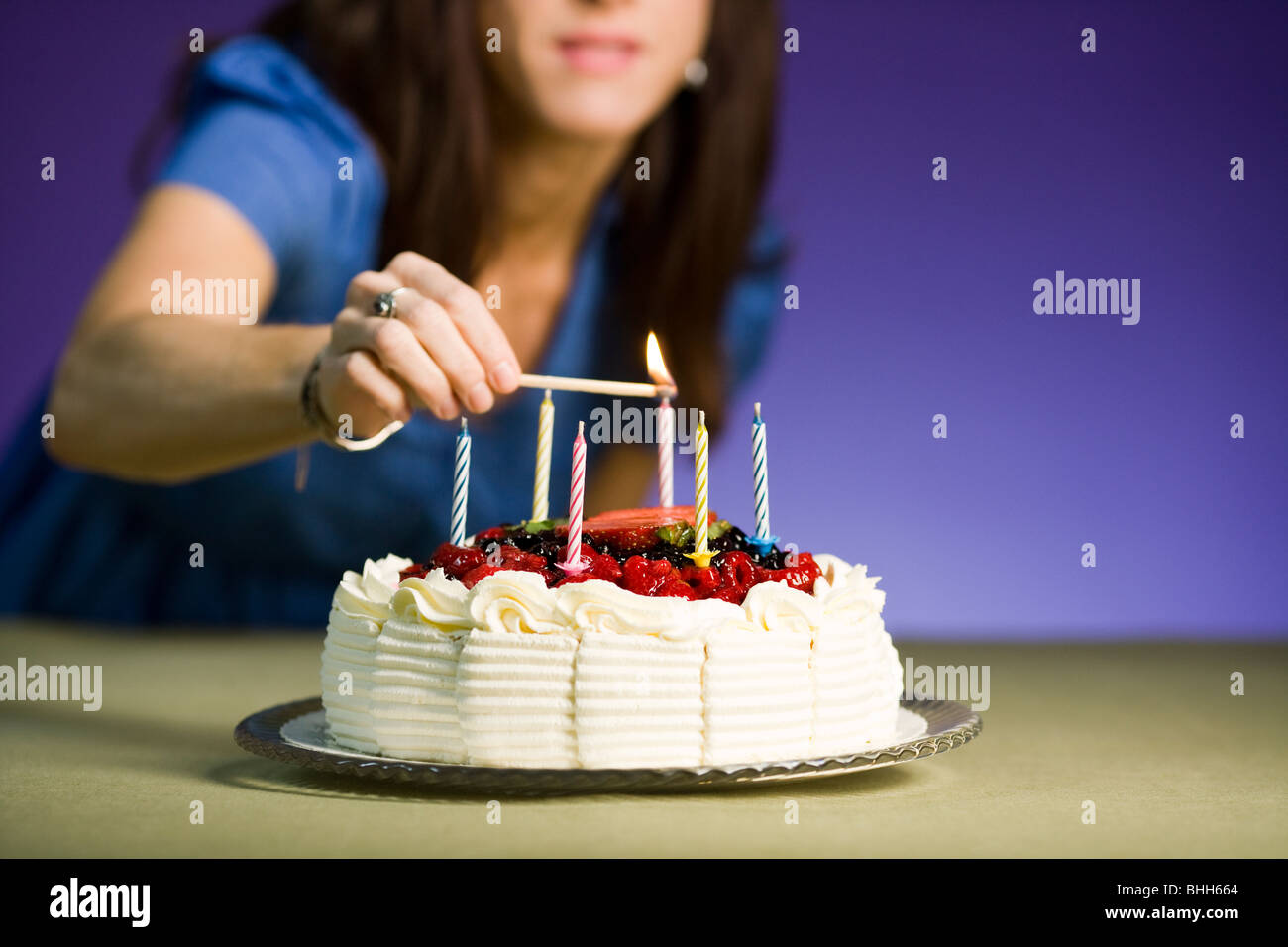 Woman with a birthday cake Stock Photo - Alamy