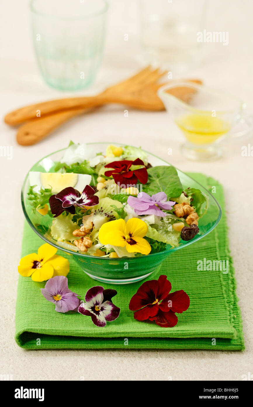 Salad with flowers. Recipe available Stock Photo - Alamy