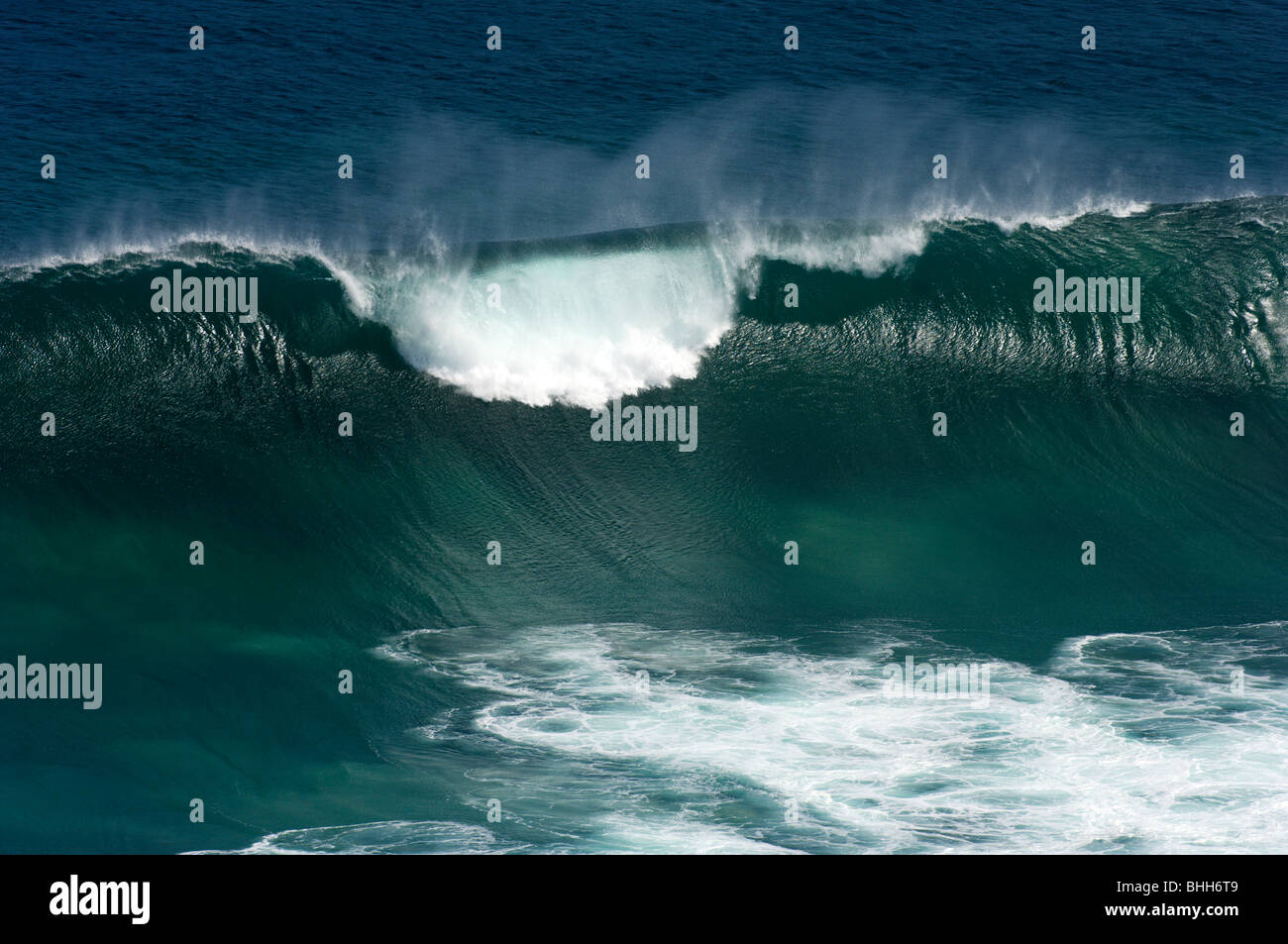 The breaking of a wave, Indonesia Stock Photo - Alamy