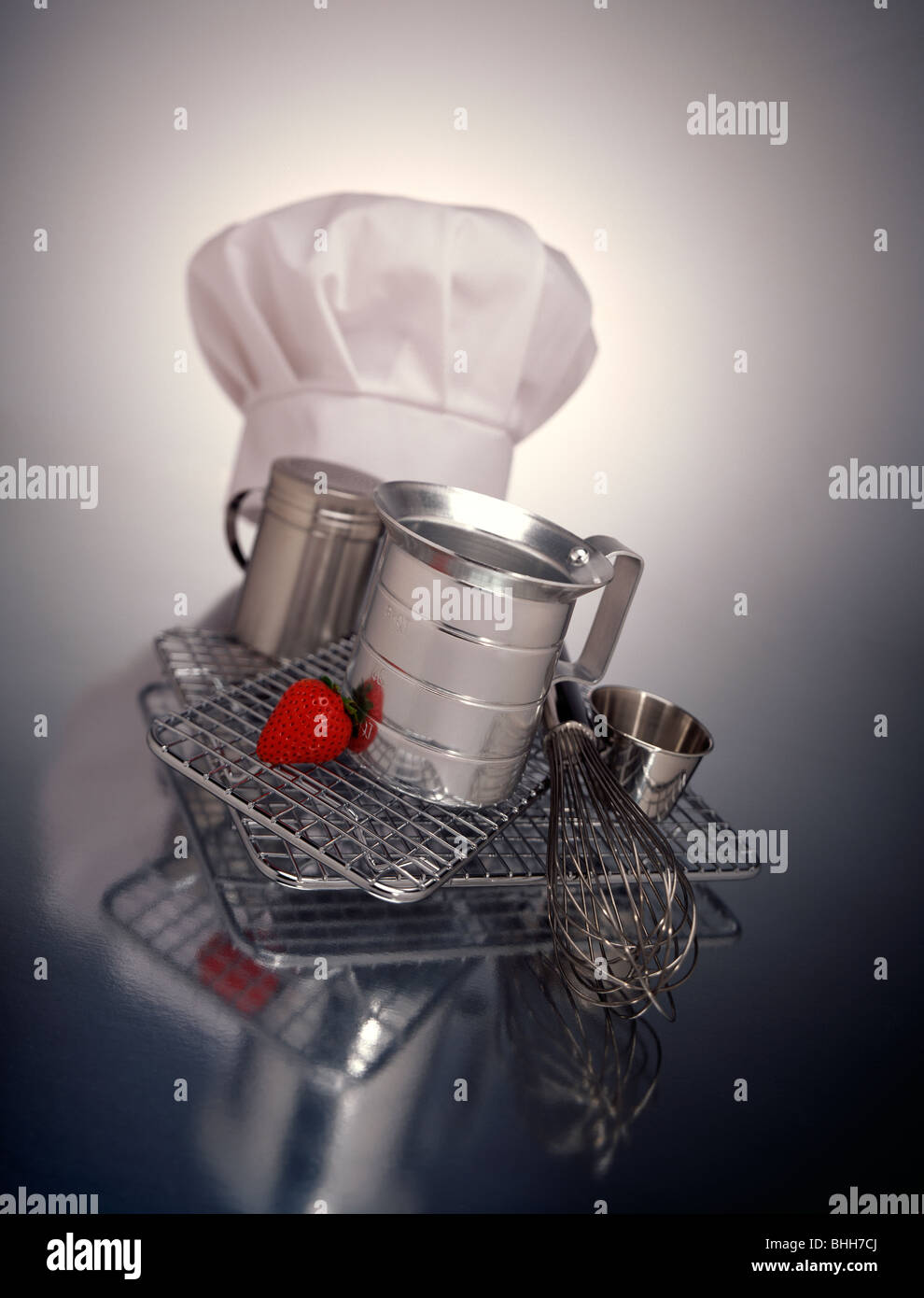Utensils kitchen strawberry aluminum still life vertical hi-res stock ...