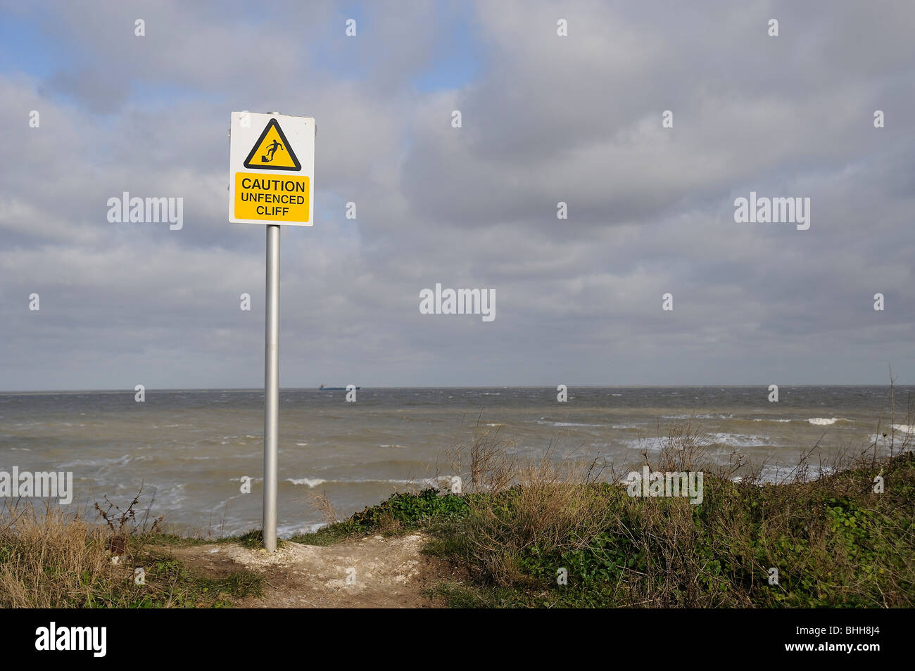 Caution Unfenced Cliff Sign joss bay Kent England Stock Photo - Alamy
