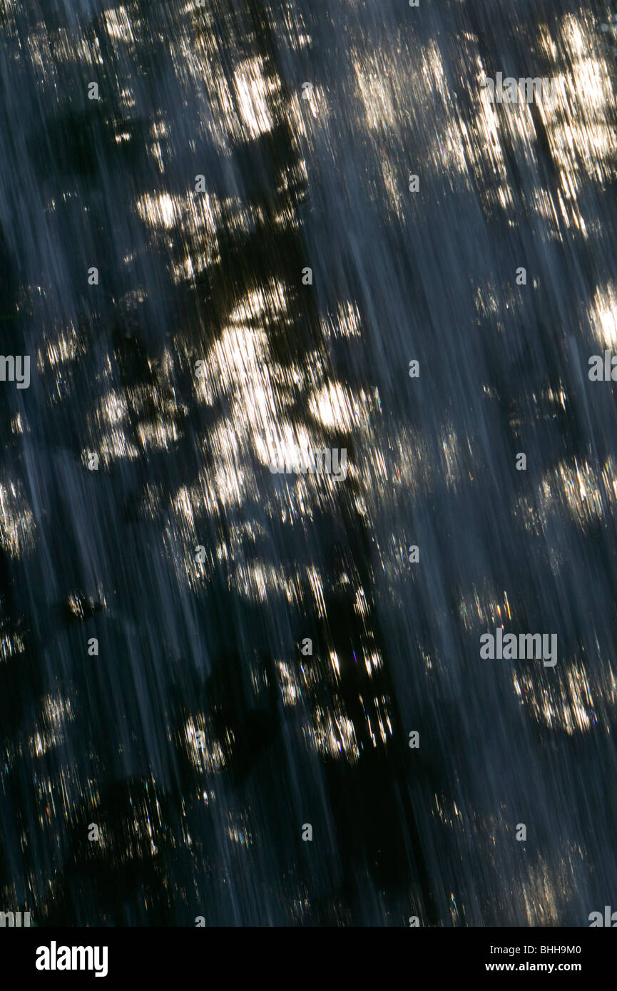 Sun shining through falling water hi-res stock photography and images ...