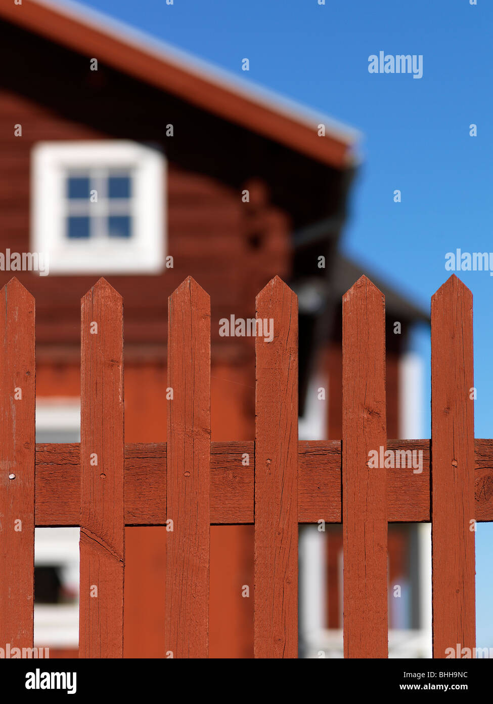 A red wooden fence, Sweden Stock Photo - Alamy