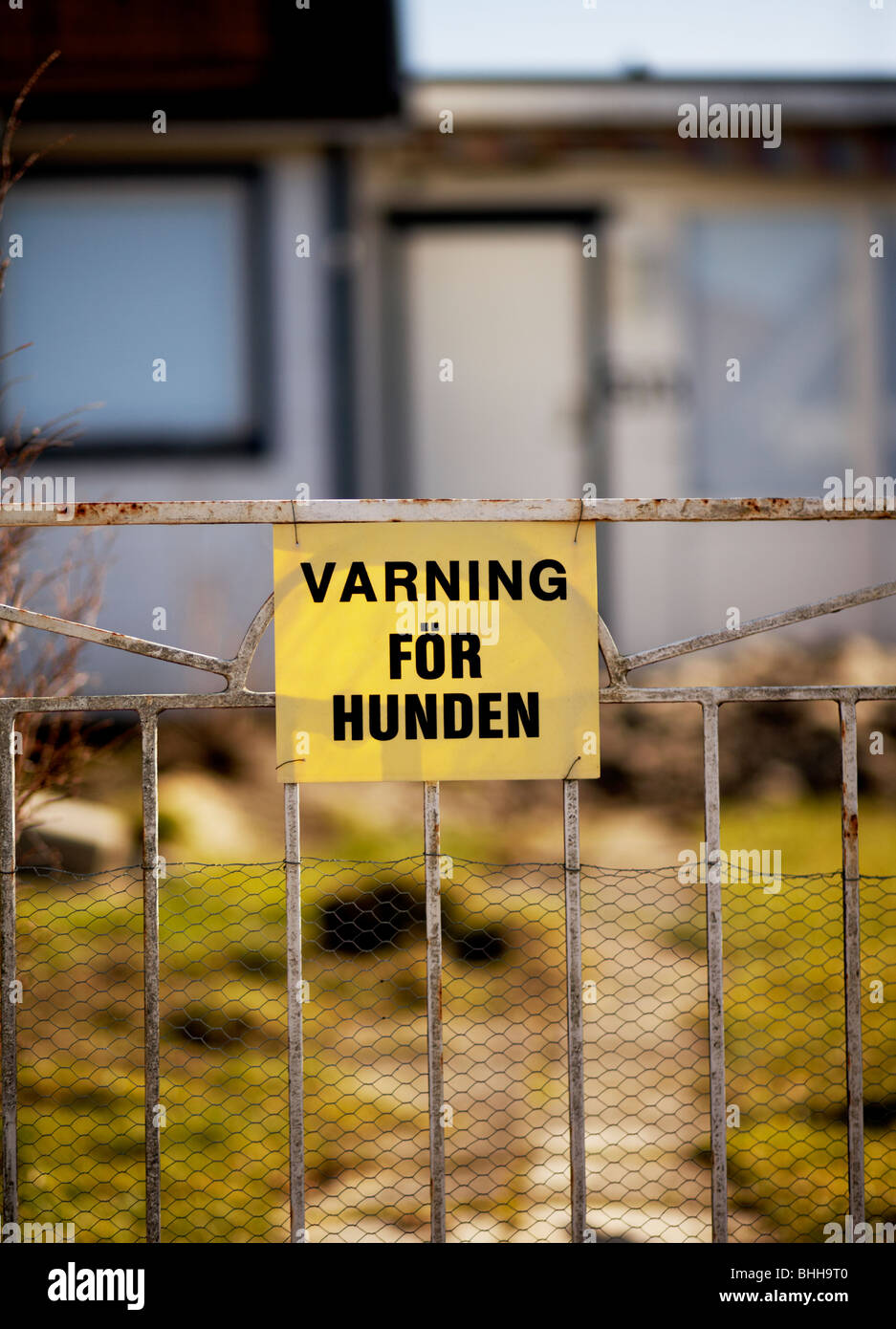 Warning sign on a gate, Sweden Stock Photo - Alamy