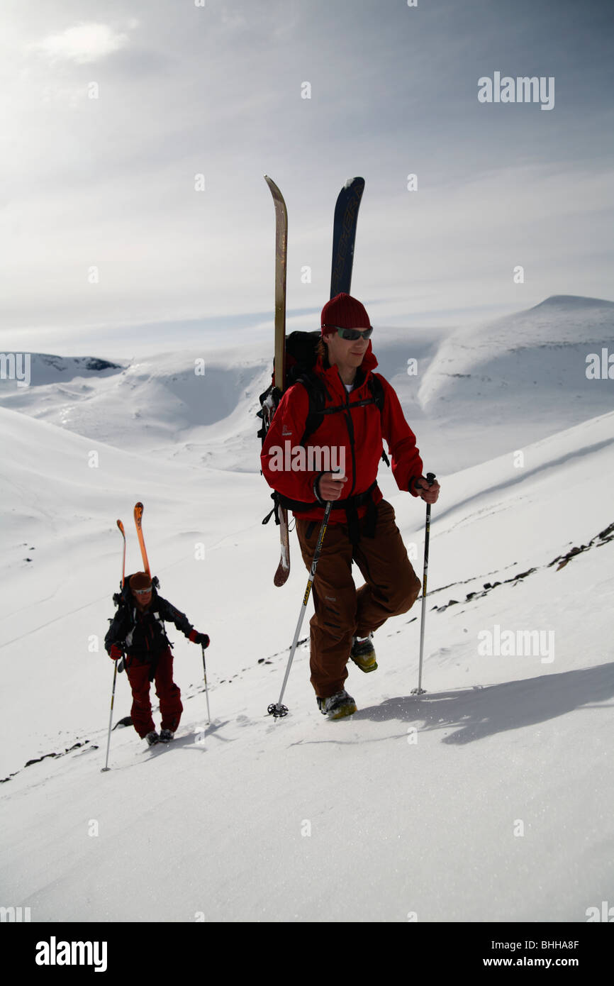 Two skiers walking uphill, Abisko, Lapland, Sweden Stock Photo - Alamy