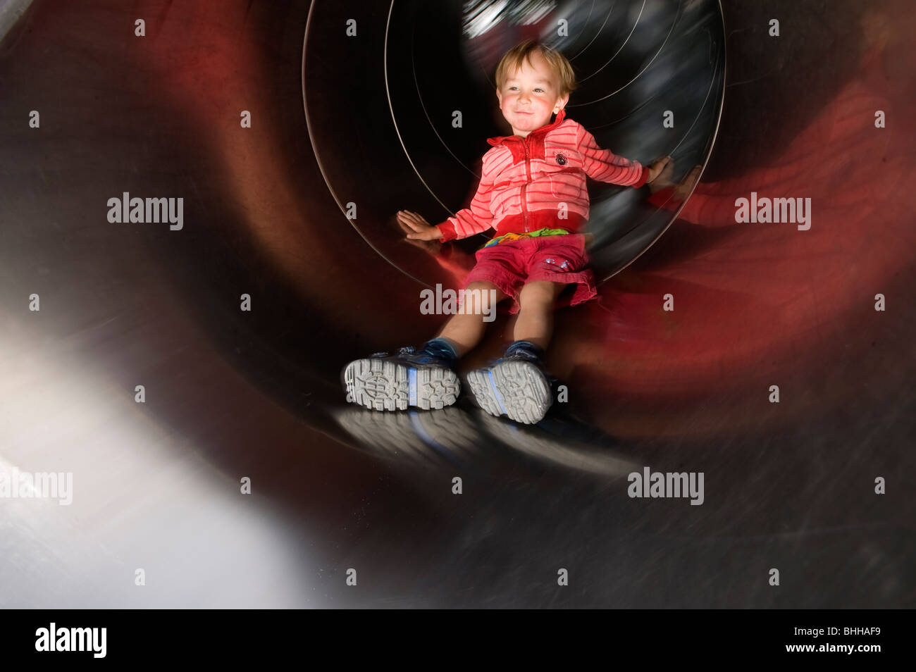 A boy going on a slide, Sweden Stock Photo - Alamy