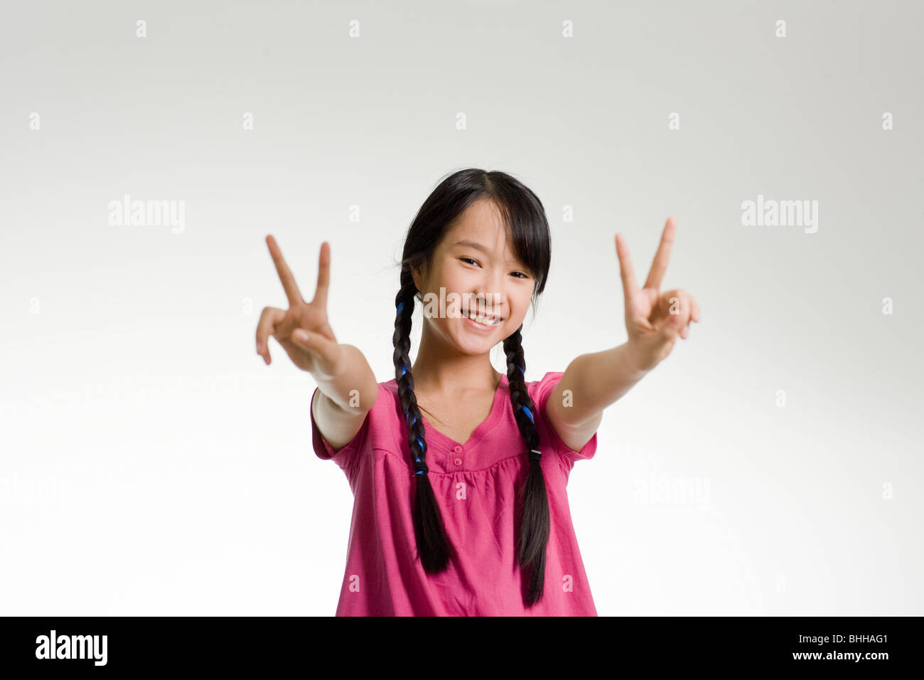 Girl making gestures Stock Photo - Alamy