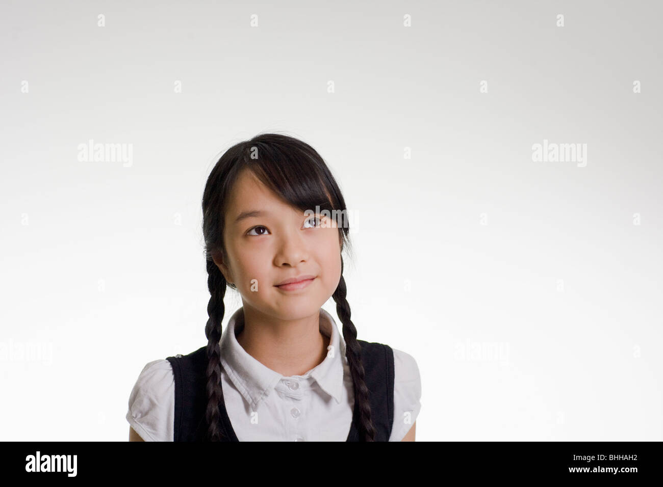 Girl looking up Stock Photo - Alamy