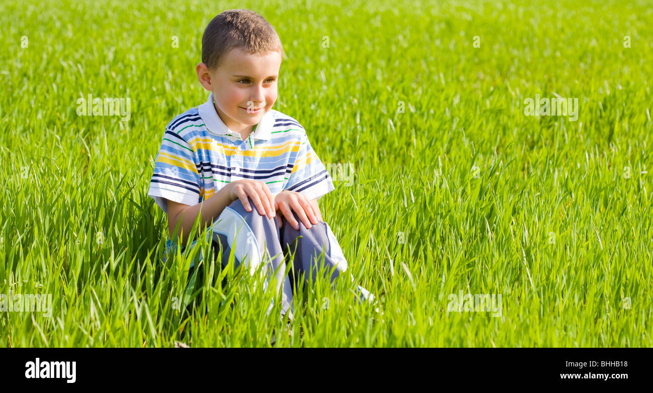 Portrait of a cute kid in a wheat field Stock Photo - Alamy