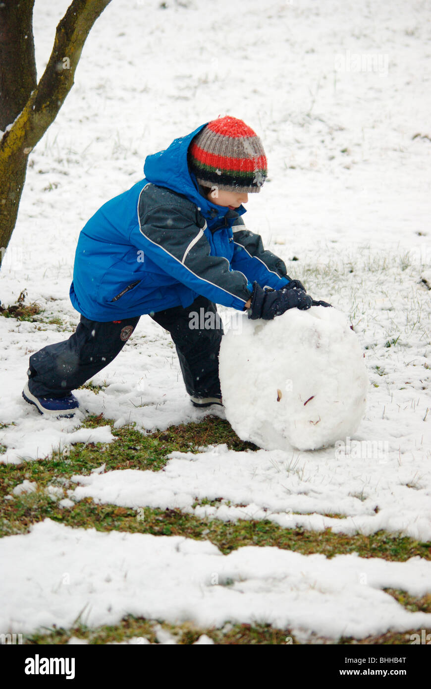 child play in the snow Stock Photo - Alamy