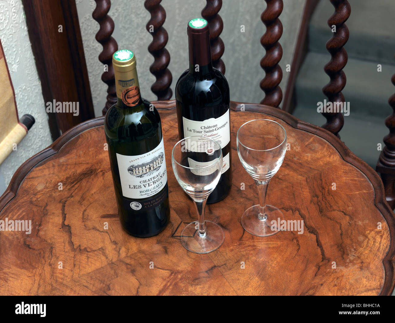 Two Bottles of Wine and Two Glasses Stock Photo - Alamy