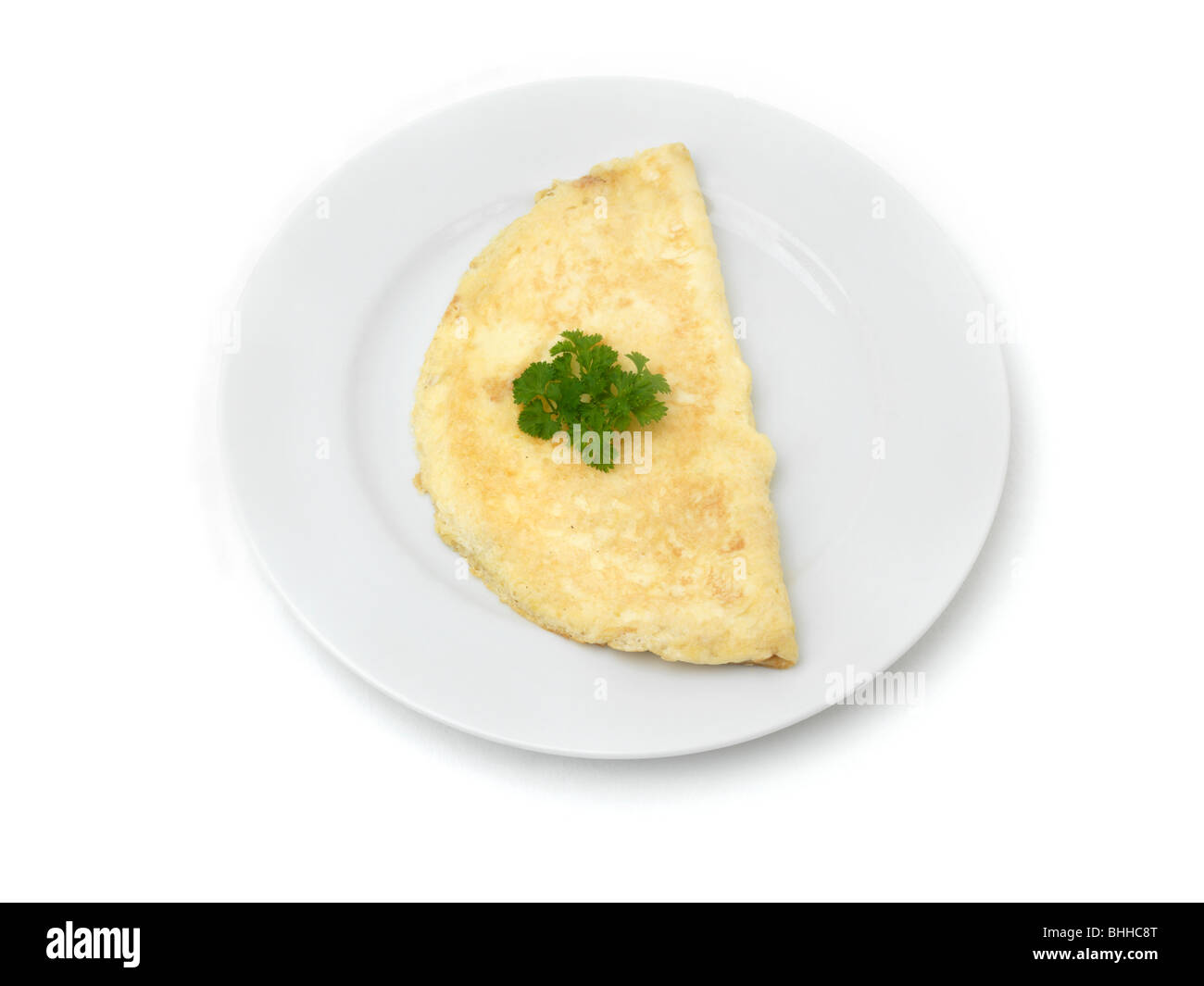 A Plate with Omelette and a bit of Garnish Stock Photo - Alamy