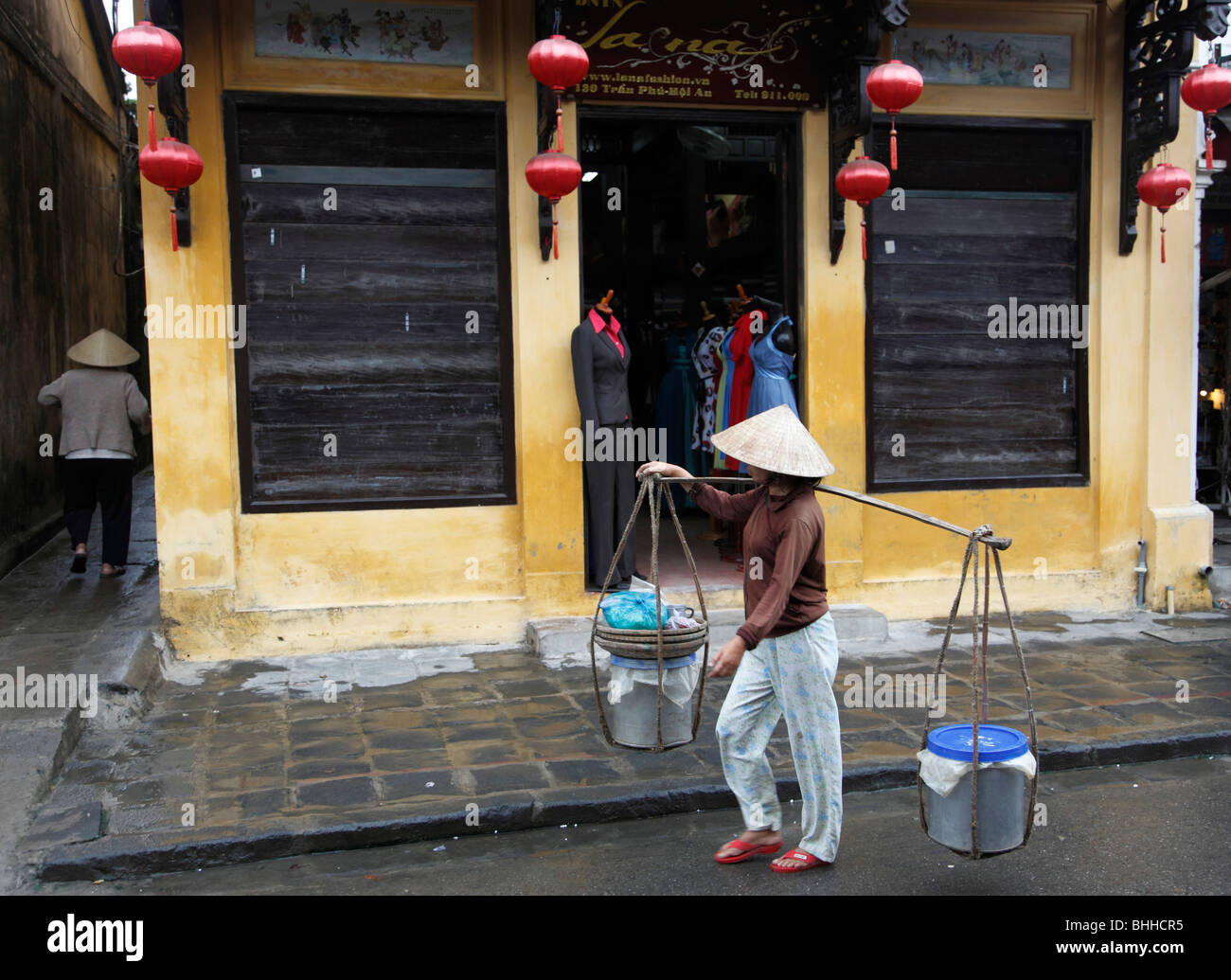 Bamboo carrying pole hi-res stock photography and images - Alamy