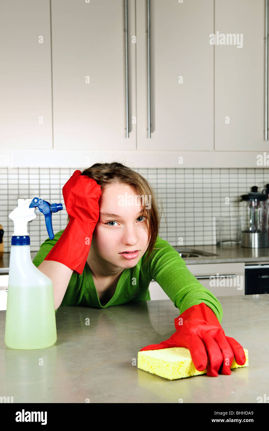 Teen girl doing household chore hi-res stock photography and images - Alamy