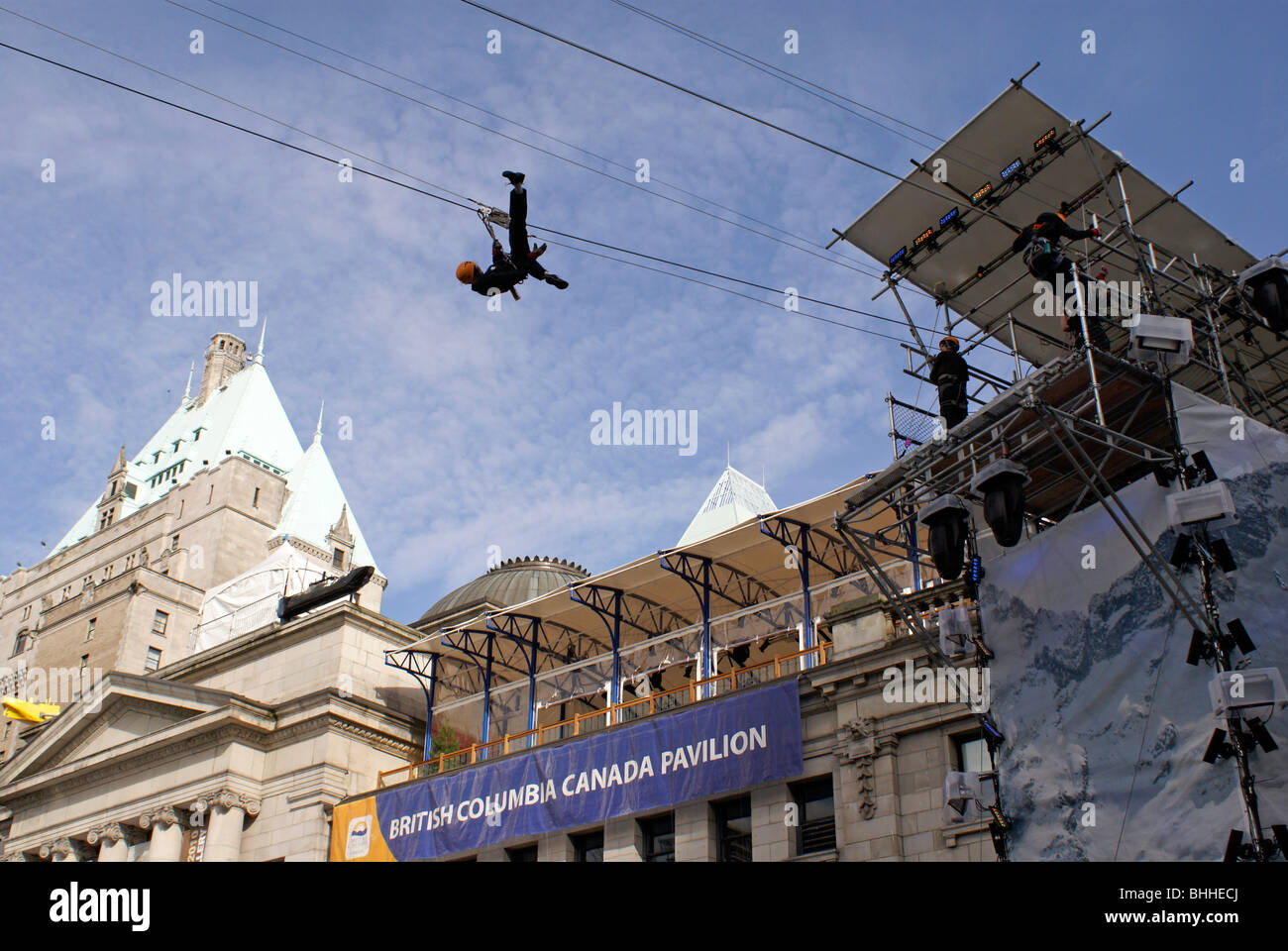 Person ziplining over Robson Square in downtown Vancouver, 2010 Winter ...