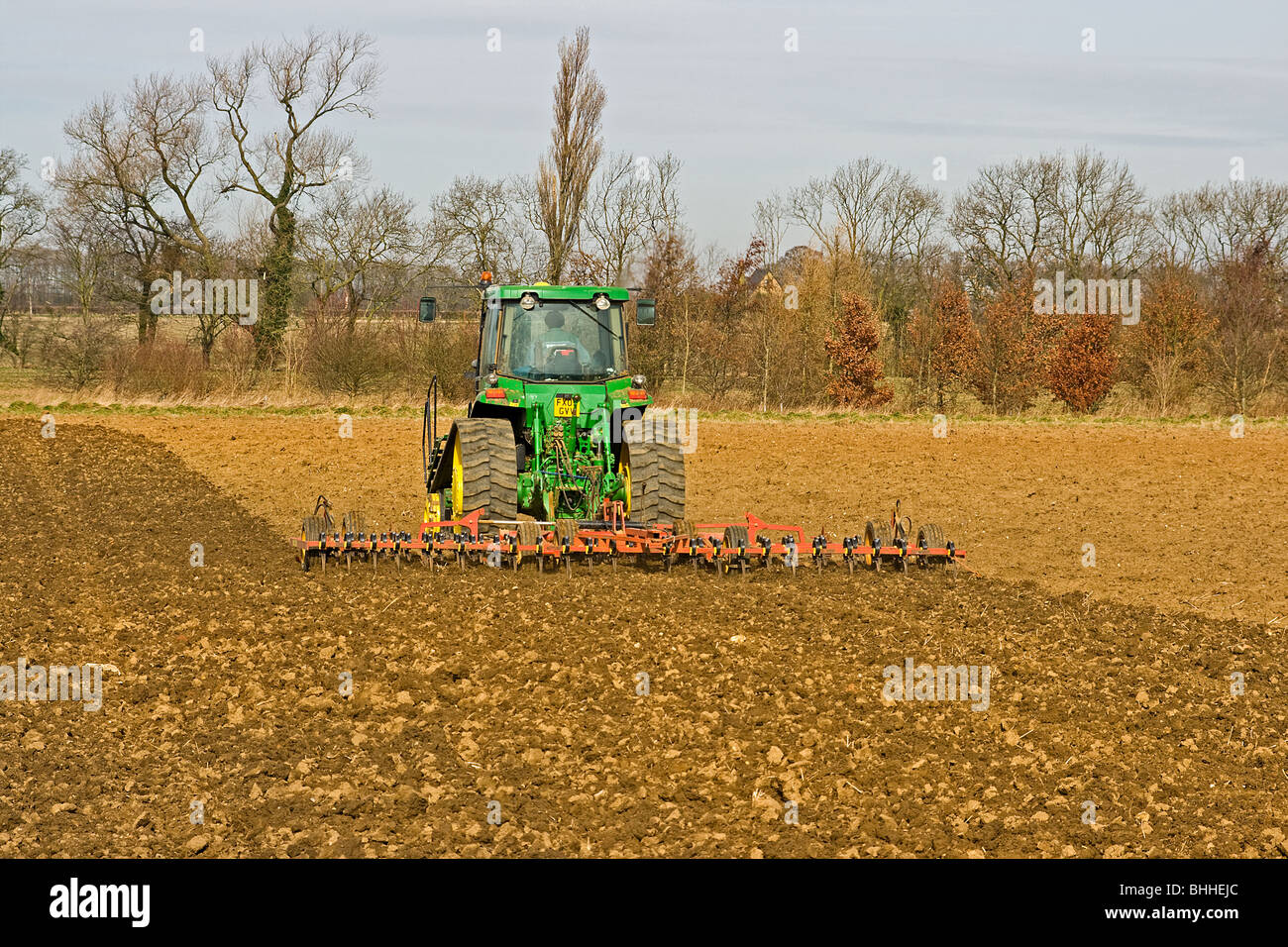 Farming in Lincolnshire - John Deer track tractor pulling soil ...